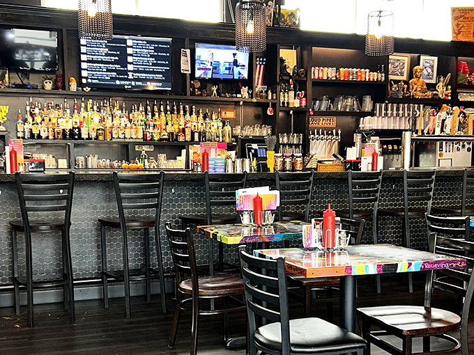 Pinky's bar isn't just stocked – it's a liquid library with enough options to write a dissertation on the art of the perfect pour.