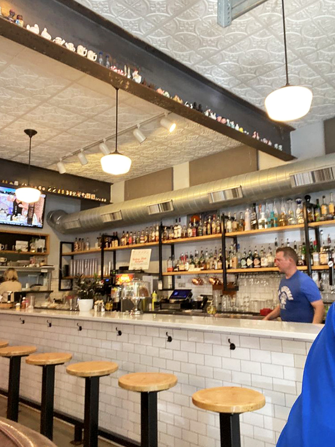 A bar that says "pull up a stool and stay awhile." The impressive bottle collection isn't just decoration—it's a promise of good times ahead.