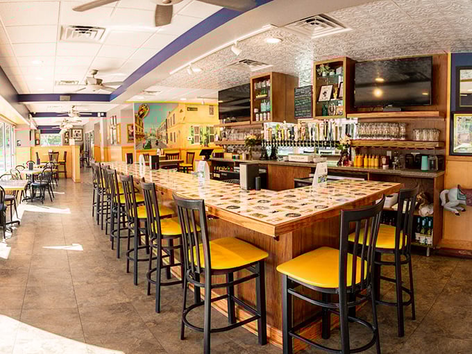 The bar area beckons with enough beer options to make choosing feel like a delicious homework assignment.