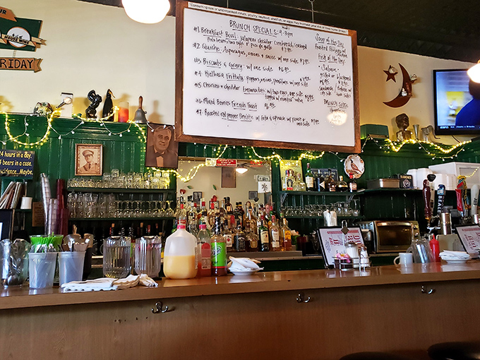 Behind the bar, where breakfast meets happy hour, a chalkboard announces daily specials like breaking news you actually want to hear.