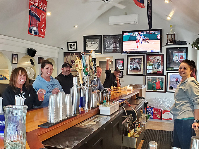 Where locals gather to watch the game, share stories, and debate the eternal question: fried or broiled?