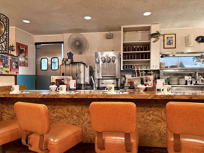 The heart of operations &ndash; where coffee flows freely and servers call out orders in a choreographed dance as old as diners themselves.