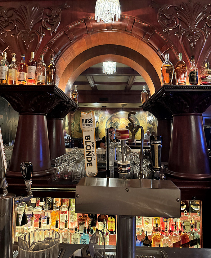 A bar back that showcases bottles like trophies. Each spirit stands at attention, waiting to transform an ordinary evening into a memorable night.