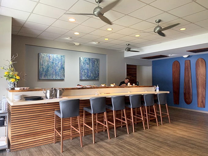 Modern elegance meets island casual at this inviting bar where the wooden accents remind you you're still in paradise.