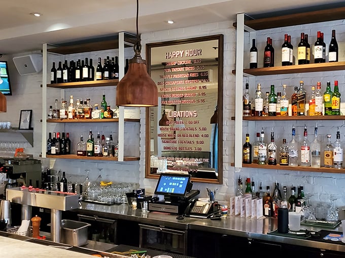 A well-stocked bar signals serious intentions about your evening, with bottles arranged like a liquor library of liquid possibilities.