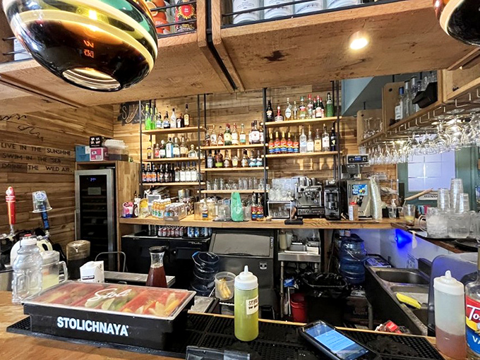 A bar stocked like someone raided the liquor cabinet of your most interesting friend who travels too much.