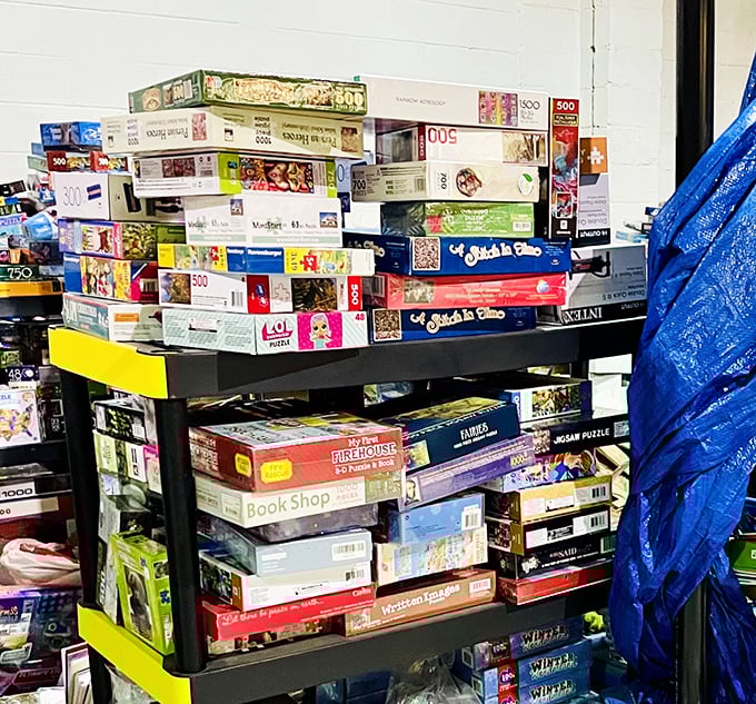 Puzzle paradise! These stacked boxes contain thousands of hours of family entertainment and coffee table frustration.