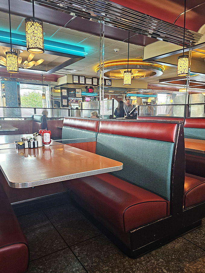 Those red vinyl booths have heard more stories than a bartender on New Year's Eve. Classic diner seating that welcomes you like an old friend. 