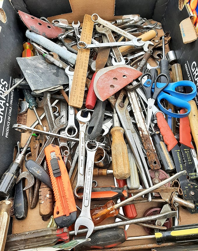 A toolbox explosion reveals wrenches, pliers, and implements that built America one project at a time.