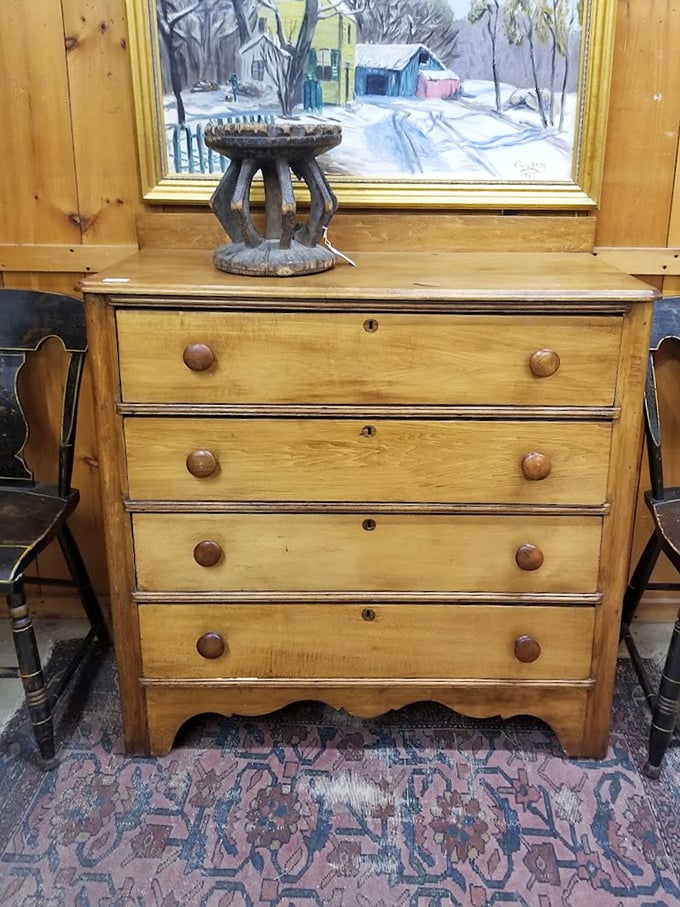 This honey-toned dresser with original hardware exemplifies the quality construction that modern furniture can only dream about.