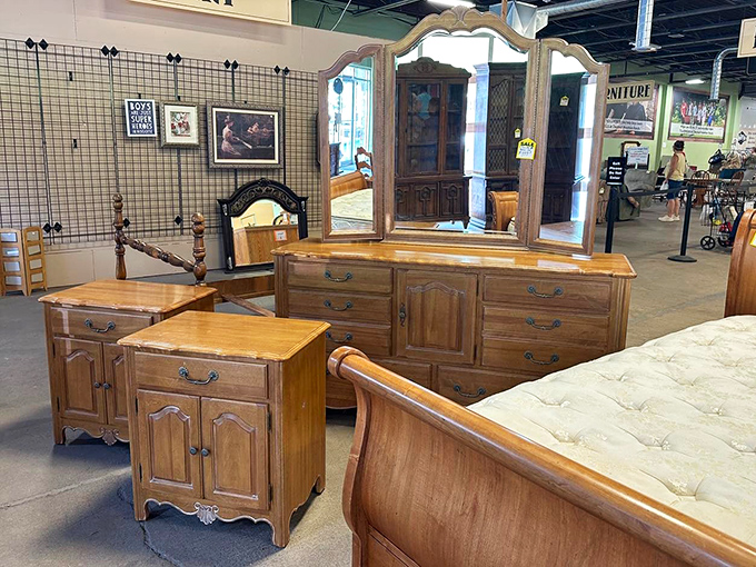Bedroom furniture with more character than most Hollywood scripts. That dresser with mirror would sell for ten times the price in an antique shop.