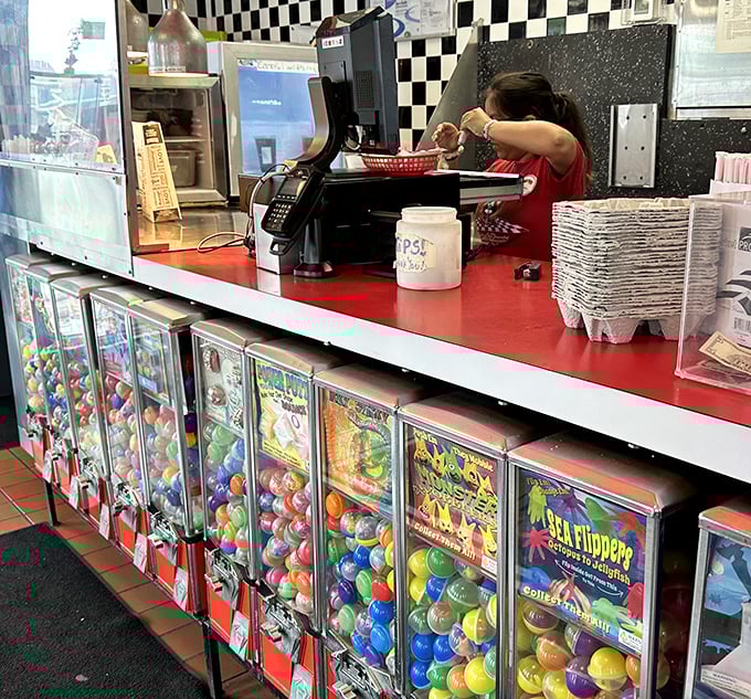 Where dreams and orders meet. Those candy machines standing at attention remind us that dessert isn't just a course&mdash;it's a constitutional right.