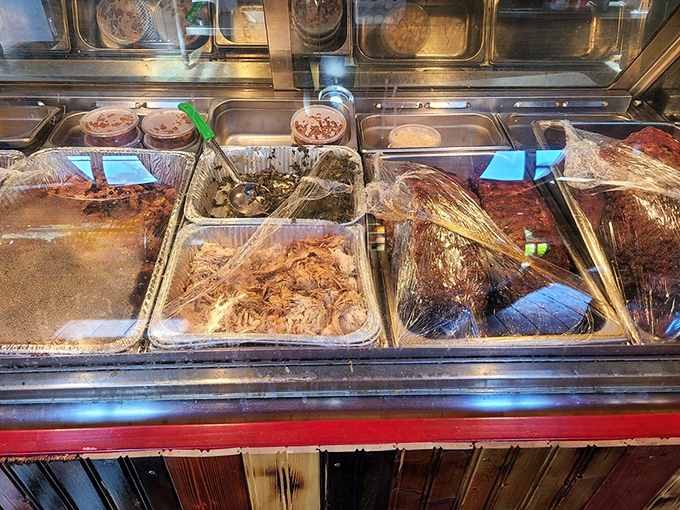 Behind the counter, trays of smoked treasures await their destiny. Like a jewelry store, but the gems are edible and bring more happiness.