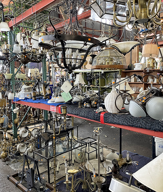 The lighting section glows with potential&mdash;chandeliers that once illuminated grand spaces now waiting for their second act.