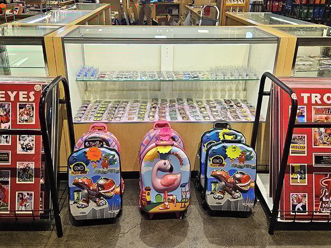 Kids' luggage that makes airport tantrums slightly more bearable because at least the meltdown happens next to an adorable flamingo suitcase.