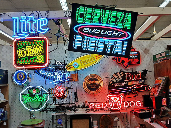 The neon graveyard glows with the ghosts of bars past. Nothing says "sophisticated man cave" like a beer sign that outshines your TV. 