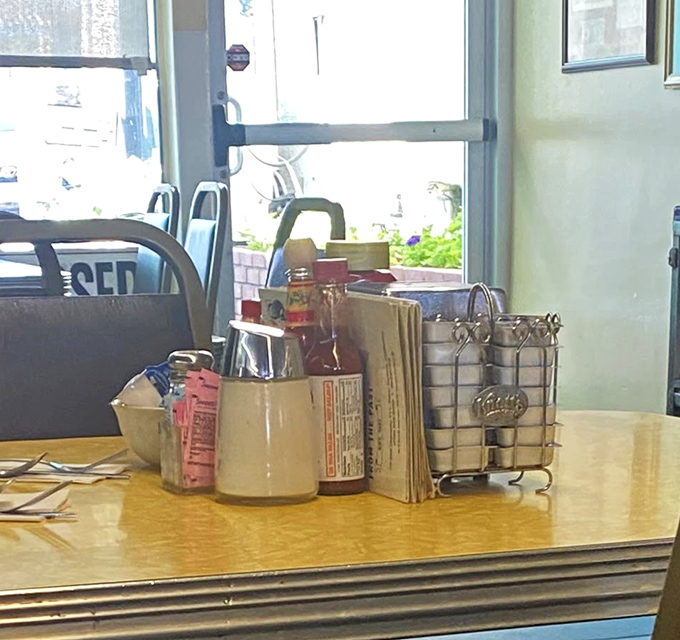 The classic table setup—condiments standing at attention, ready to enhance your meal without stealing the spotlight.