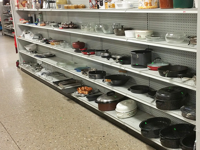 Cast iron skillets and vintage cookware line the shelves like culinary artifacts, each with decades of meals in their past and many more in their future.