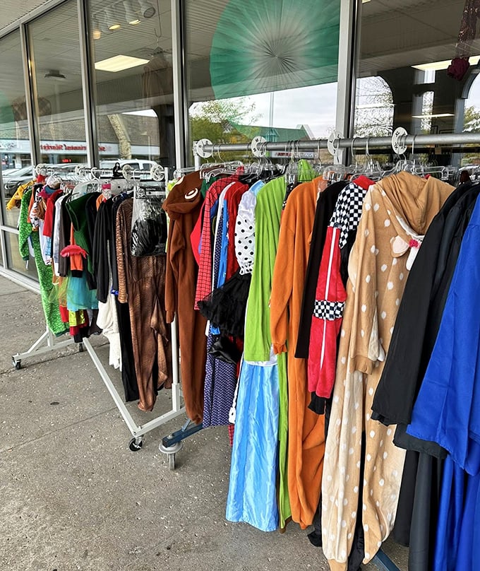 Costume racks outside display colorful character options, suggesting Halloween planning or theatrical productions on genuinely achievable budgets.