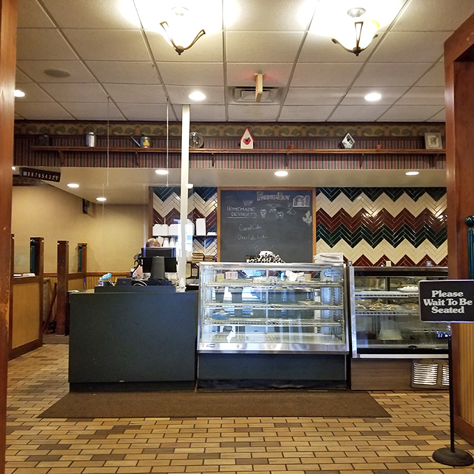 The counter area—where desserts tempt you from behind glass like celebrities at a meet-and-greet you can actually afford.