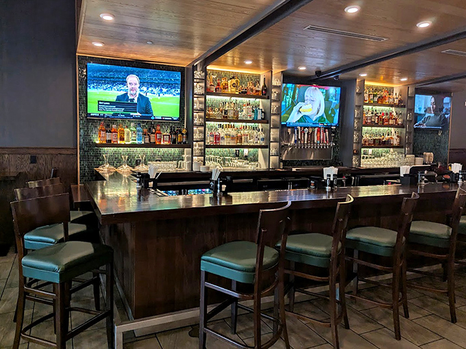 The bar area: where sports fans and bourbon aficionados find common ground in their appreciation for liquid artistry.