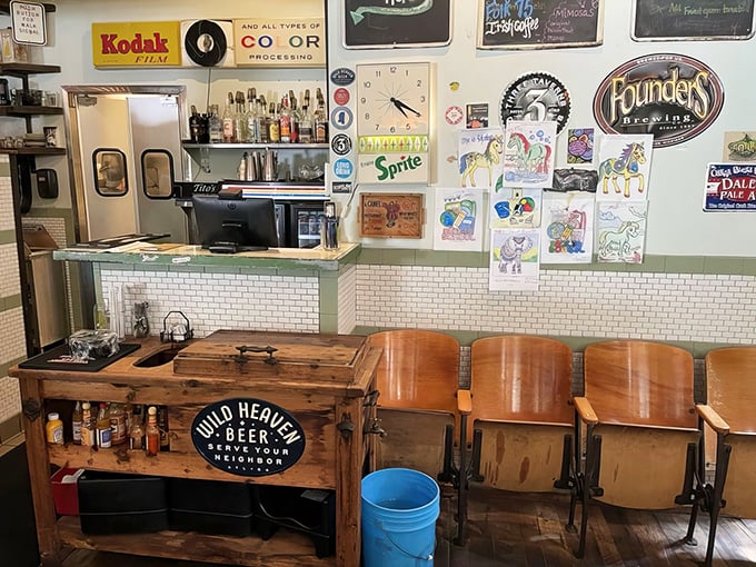 That counter lined with hot sauce bottles and condiments signals a kitchen that understands breakfast requires personal customization.