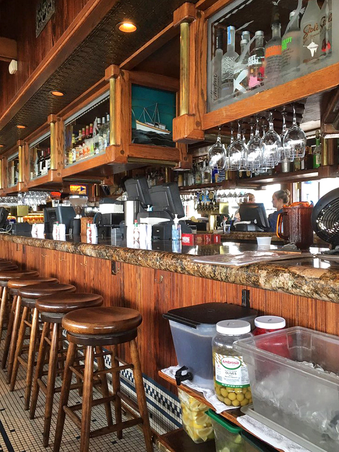 The bar area feels like it's been there forever, in the best possible way. Weathered wood, gleaming glasses, and bartenders who know the difference between a story and a tall tale.