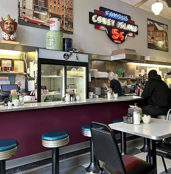 Counter seats: where the solo diner becomes part of the community and the coffee refills come before you ask.