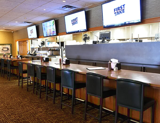 The counter seating at Kroll's West&mdash;where solo diners become part of the family and sports debates are settled over butter burgers.