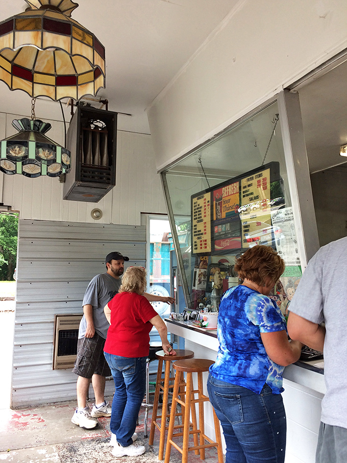 Locals know the drill: friendly chatter while waiting for food that's worth every minute of anticipation.