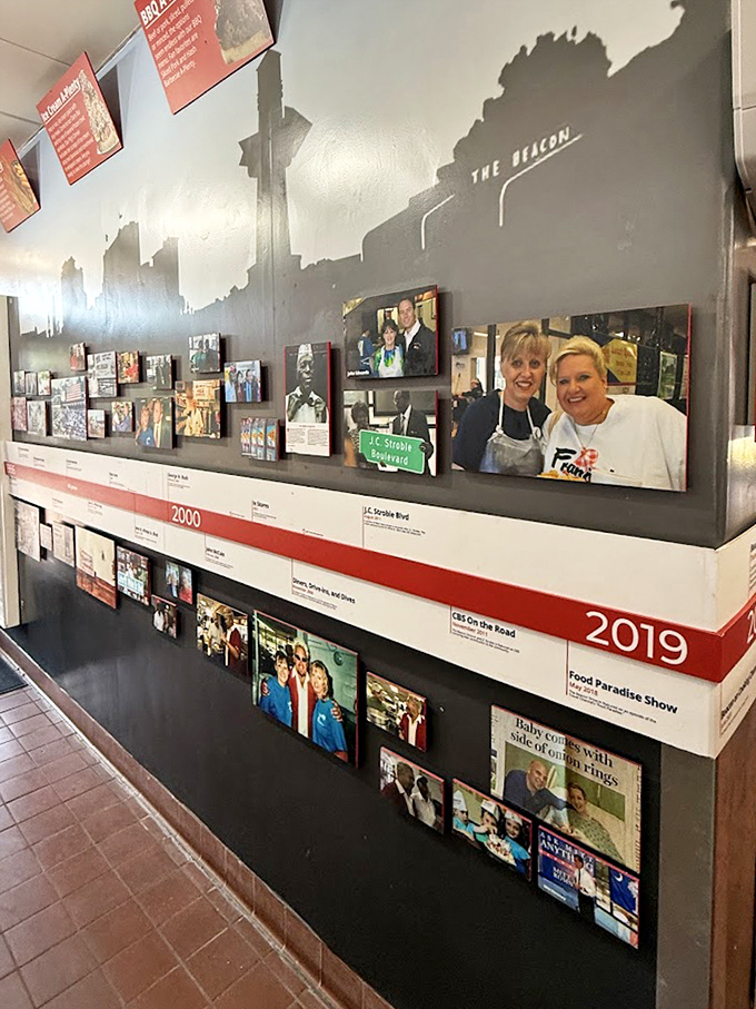 The wall of fame showcases decades of visitors, celebrities, and food shows that have made the pilgrimage to this Spartanburg institution.