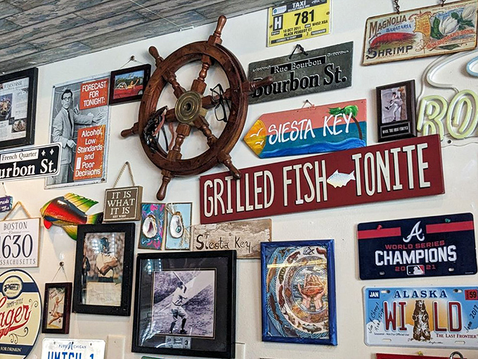 The walls tell stories of maritime adventures while that ship's wheel promises to steer you toward delicious destinations. No passport required.