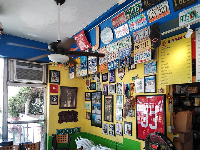 The walls tell stories of road trips past, with license plates from across America creating a roadmap of nostalgia.
