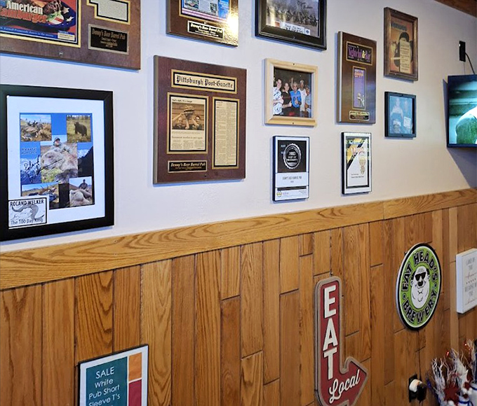 The wall of fame showcases brave souls who've tackled legendary challenges &ndash; newspaper clippings as badges of gastronomic courage.