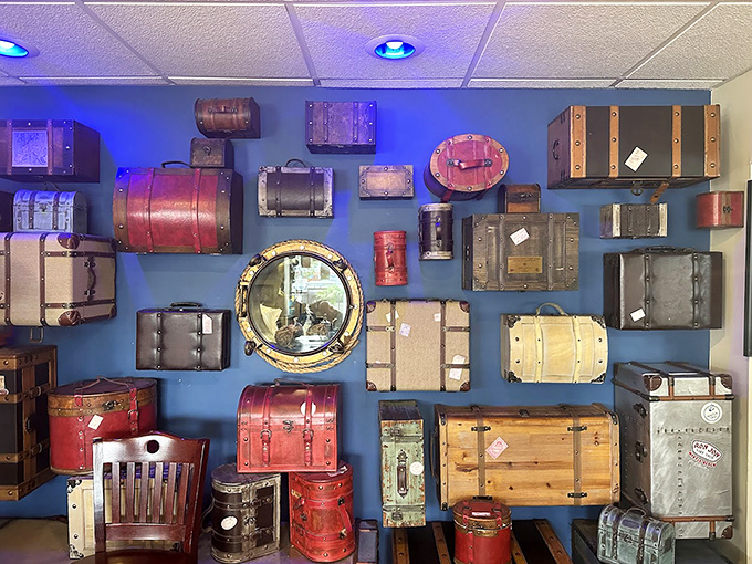 The wall of vintage luggage and nautical treasures tells stories of adventures past. This isn't just d&eacute;cor&mdash;it's a maritime museum that sets the perfect seafaring mood.