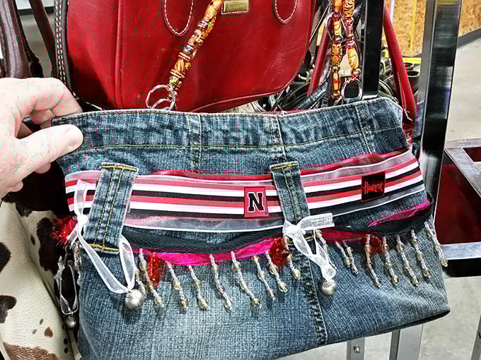 Nebraska pride meets upcycled fashion in this handcrafted denim purse. The Huskers emblem adds local flair to sustainable style.