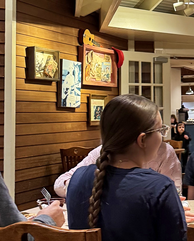 Country music memorabilia adorns wooden walls&mdash;visual appetizers while you contemplate your next trip to the buffet line.