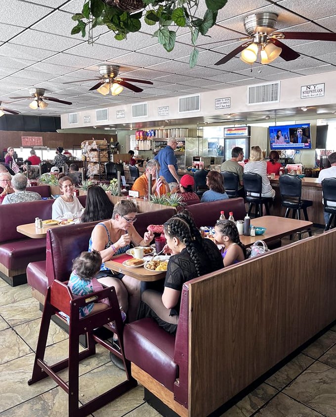 Families, friends, and solo diners sharing the universal language of "pass the syrup" in vinyl booths that have witnessed countless conversations.