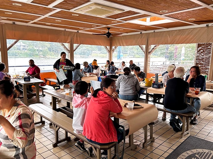 The outdoor deck where calories don't count and every sunset comes with a side of Old Bay-scented breeze.
