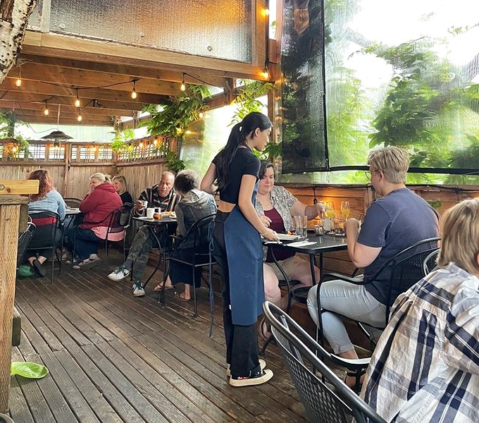 The covered patio offers a front-row seat to Portland life while friendly staff deliver plates that make everyone at neighboring tables envious.