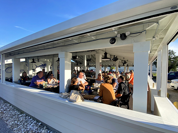 Open-air dining where the breeze carries conversations between tables &ndash; the kind of place where strangers become friends over shared love of crab legs.