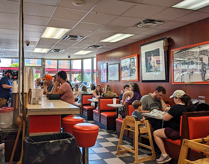 Where strangers become neighbors over shared tables and the universal language of "please pass the ketchup."