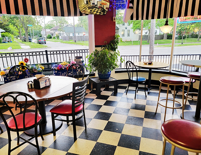 Window seats offer prime people-watching territory while you tackle portions that would make a lumberjack request a to-go box.