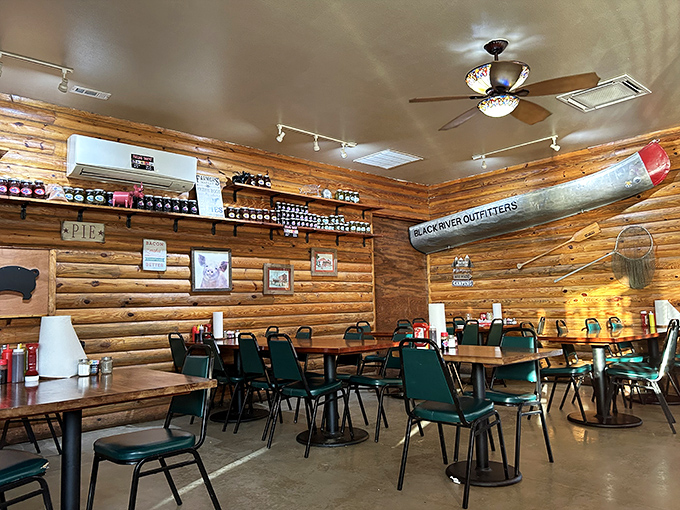 Log cabin walls and track lighting create the perfect backdrop for BBQ contemplation &ndash; like dining in a delicious woodland retreat.