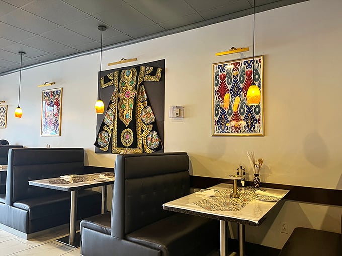 Cultural artwork adorns the walls, transforming a simple meal into a journey through Uzbek traditions without needing a passport.