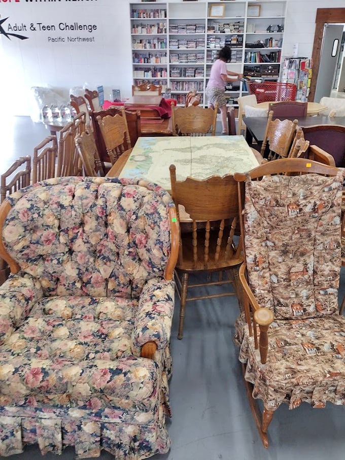 Vintage chairs surround a dining table like old friends gathering for coffee, their floral upholstery telling tales of decades past.