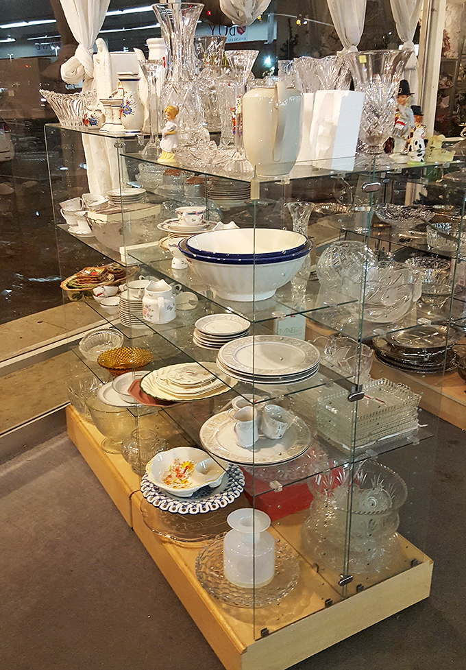 Elegance on a budget! This glass display case showcases fine china and crystal that would make your grandmother swoon&mdash;without making your wallet weep.