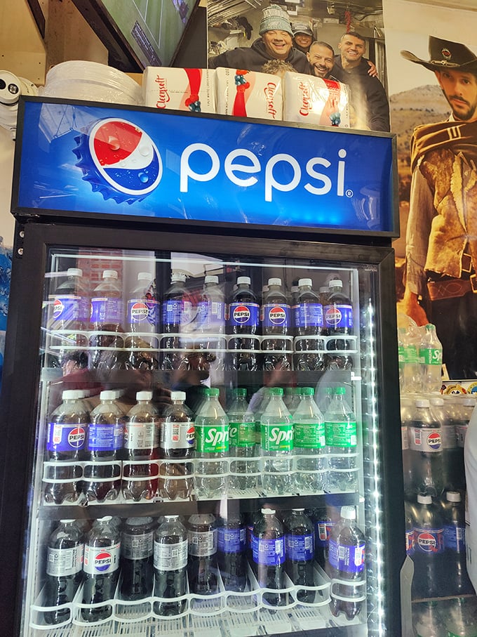 The beverage cooler: where Pepsi products stand ready to combat the glorious salt intake you're about to experience.