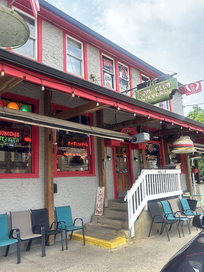 The Turf Club's exterior promises good times ahead with its vintage sign, string lights, and an invitation to step into a world where food matters.