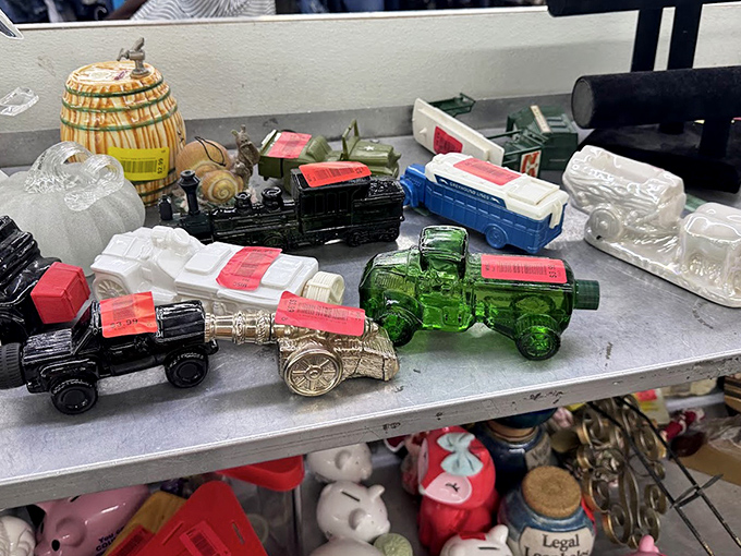 Miniature tractors and collectibles line the shelves like toys from a grown-up's Christmas list, each tiny vehicle carrying outsized charm and nostalgia.